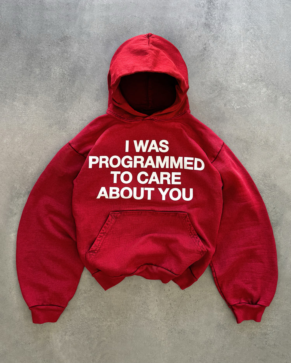 "PROGRAMMED TO CARE" HOODIE